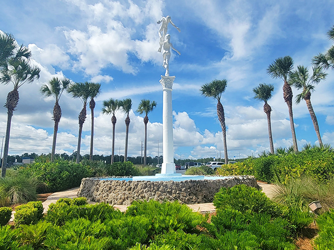 A mermaid statue surrounded by palm trees&mdash;Florida's subtle way of saying, "Yes, we embrace our wonderfully weird mythology."