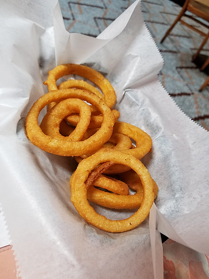 Onion rings with that perfect crunch that announces itself to the entire restaurant. These golden halos of happiness make an excellent companion to any sandwich.