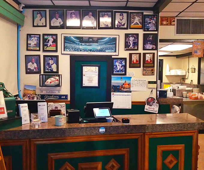 The counter tells stories through baseball memorabilia and local photos. It's where first-timers become regulars and servers remember your usual order.