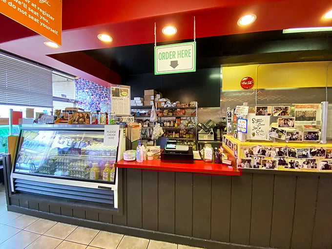 Where breakfast dreams begin: the ordering counter at Joe's Cafe, where "yes" is the correct answer to "Would you like more coffee?"