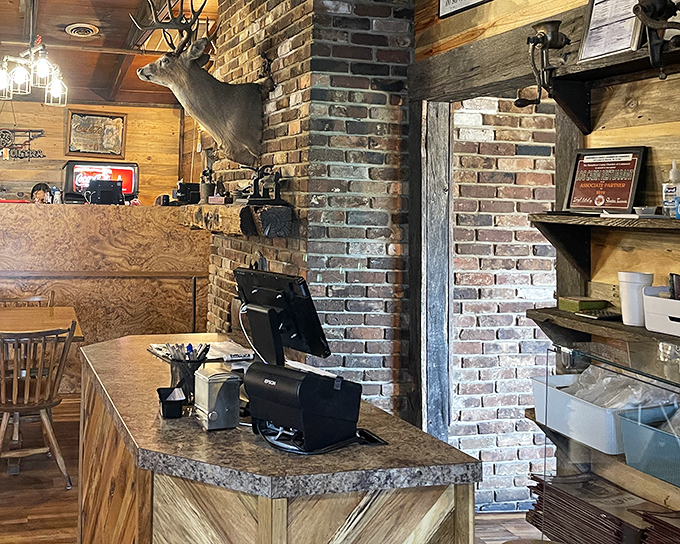 The rustic order counter where culinary dreams begin, complete with the watchful gaze of local wildlife keeping tabs on your order.