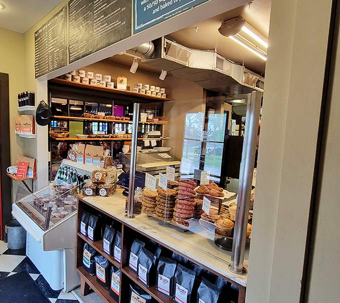 Pastries and coffee beans await their moment of glory. This counter is where morning dreams come true.