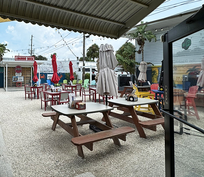 The outdoor seating area&mdash;where picnic tables and Florida sunshine combine to create the perfect post-swim dining experience.