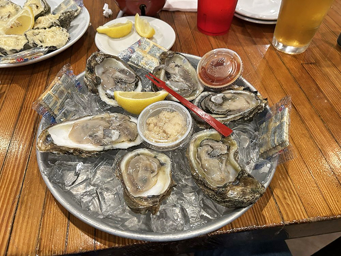 Raw oysters on the half shell—nature's perfect appetizer, requiring nothing more than a squeeze of lemon and a sense of adventure.