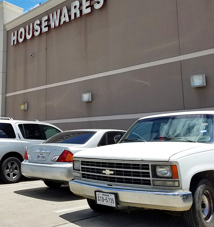 Even the exterior announces its purpose with architectural clarity. That "HOUSEWARES" sign might as well say "POSSIBILITIES."