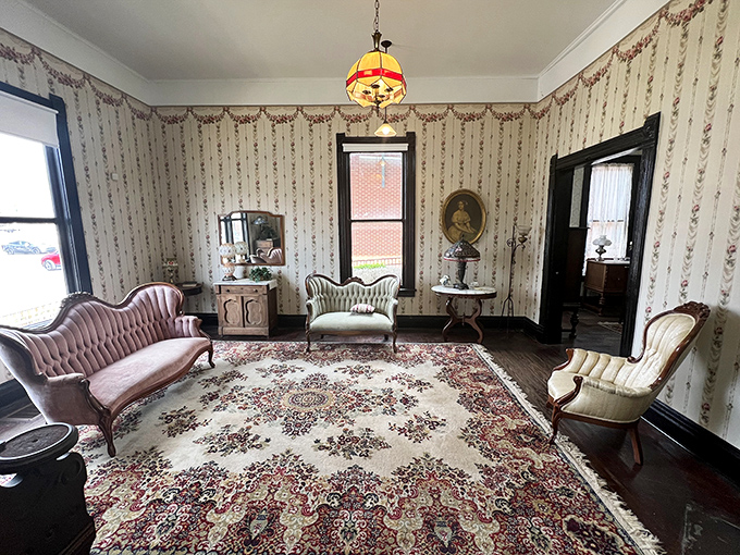 The formal parlor, with its curved Victorian furniture and intricate carpet, shows how folks entertained guests when Netflix wasn't an option.