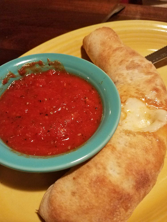 This pepperoni roll isn't messing around&mdash;it's the superhero of appetizers, cape optional, marinara dipping sauce mandatory.