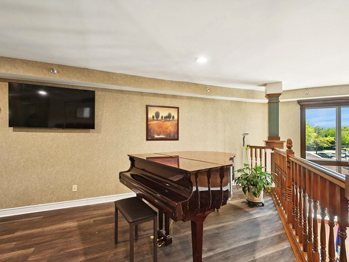 The piano waits patiently for someone to play "As Time Goes By," while natural light streams in through windows that frame Missouri's changing seasons.