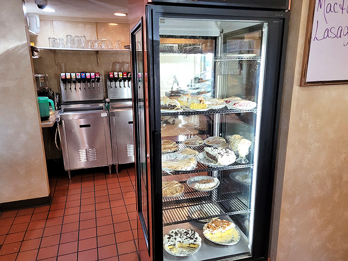 The pie display case &ndash; where willpower goes to die and happiness begins its sugary reign.
