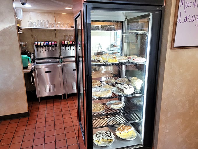 The pie display case &ndash; where willpower goes to die and happiness begins its sugary reign.