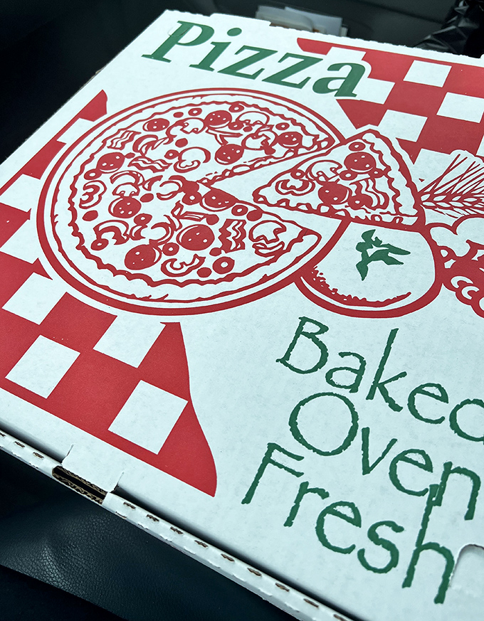"Baked Oven Fresh" isn't just a promise, it's the Imperial Pizza way. That classic red-checkered box design practically screams "good decision inside."