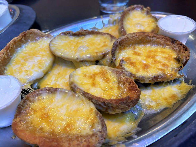 Potato skins with melted cheese that stretch like the Gateway Arch. Simple? Yes. Satisfying? Absolutely. Diet-friendly? Let's not ruin the moment.