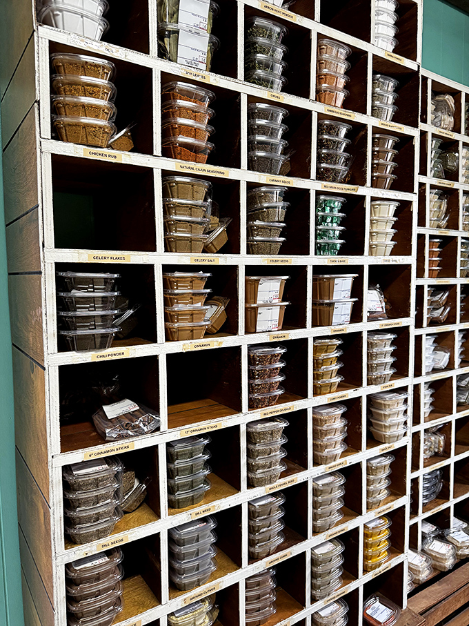 This spice display is the Fort Knox of flavor, where humble ingredients wait to transform ordinary kitchens into extraordinary ones. 