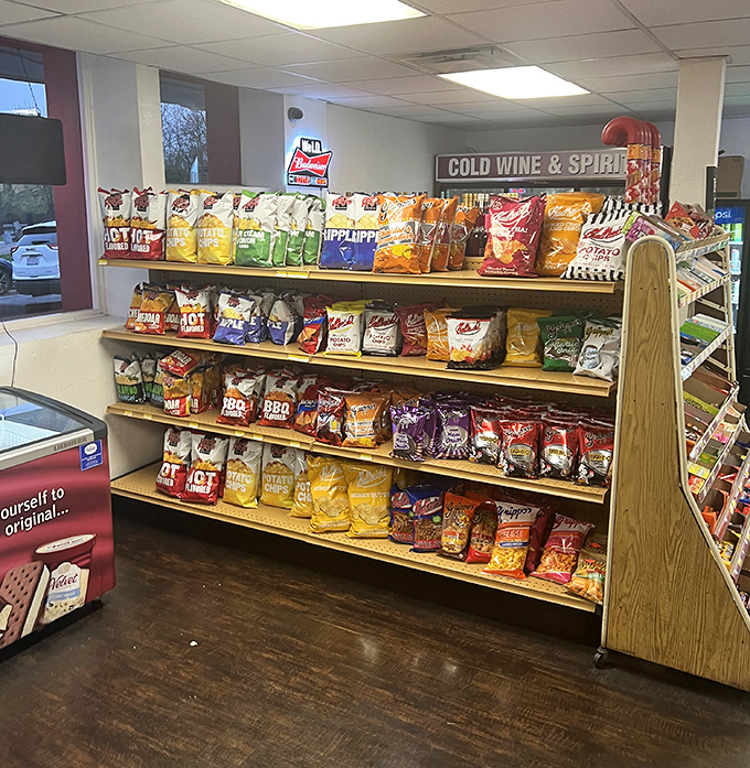 The snack aisle that understands road trips aren't about the destination but about which chips you choose for the journey. A convenience store shrine to salt and crunch.