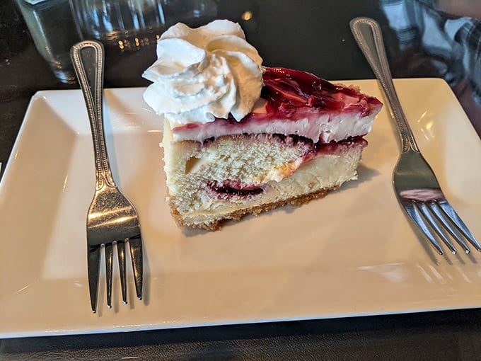 A slice of cheesecake that makes you understand why people write songs about love &ndash; the raspberry topping adding just the right amount of tartness.