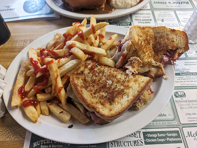The Reuben sandwich &ndash; where corned beef, sauerkraut and melted cheese create a symphony of flavors. Those ketchup-drizzled fries are the perfect sidekick.