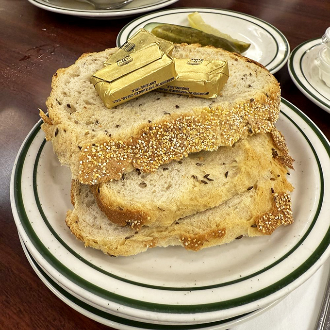 Rye bread with enough caraway seeds to make a German baker nod in solemn approval.