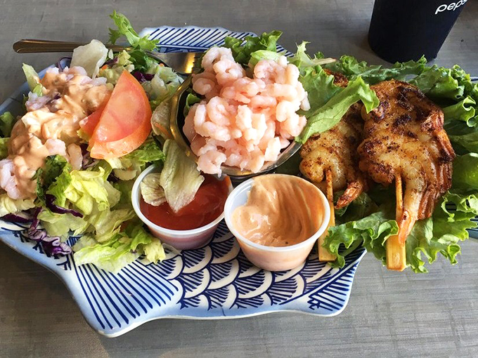 The seafood combo plate &ndash; where indecision becomes a virtue. Why choose one ocean delight when you can have them all?
