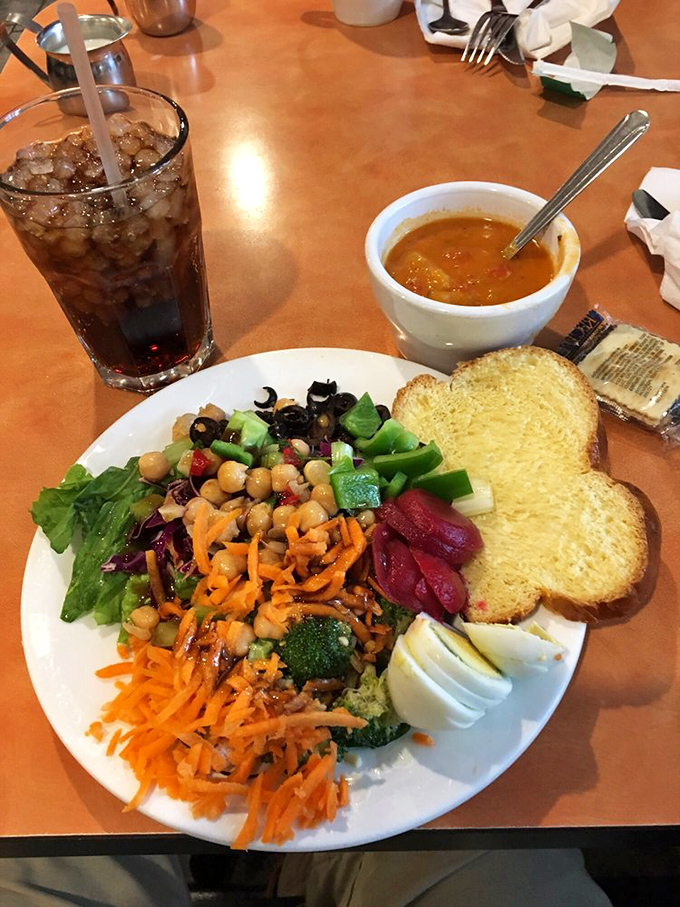 A salad that proves healthy eating doesn't have to be punishment, especially when accompanied by soup and garlic toast.