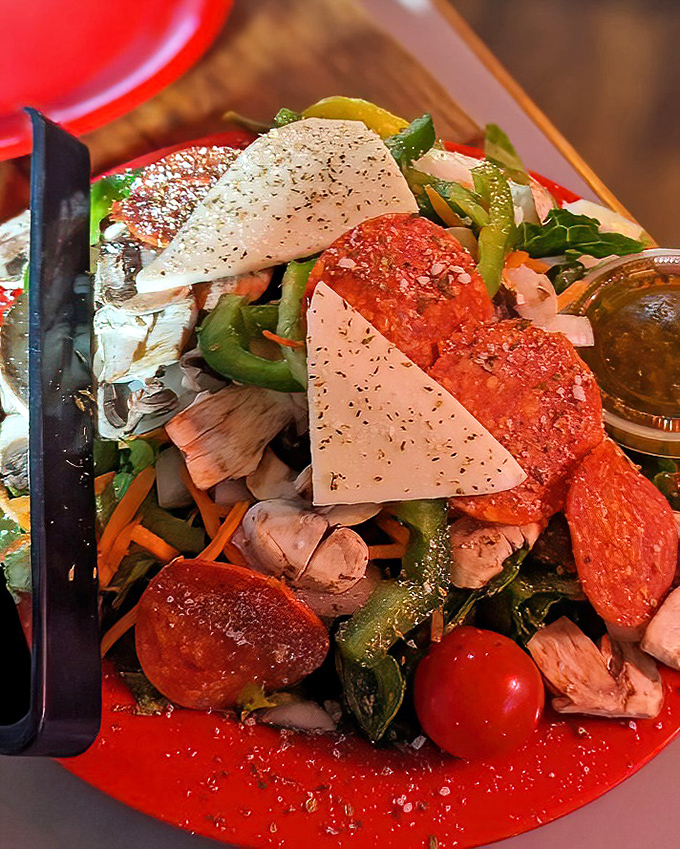 A salad at a pizza place? Yes, when it's this fresh. Consider it the opening act that somehow manages to hold its own against the headliner.