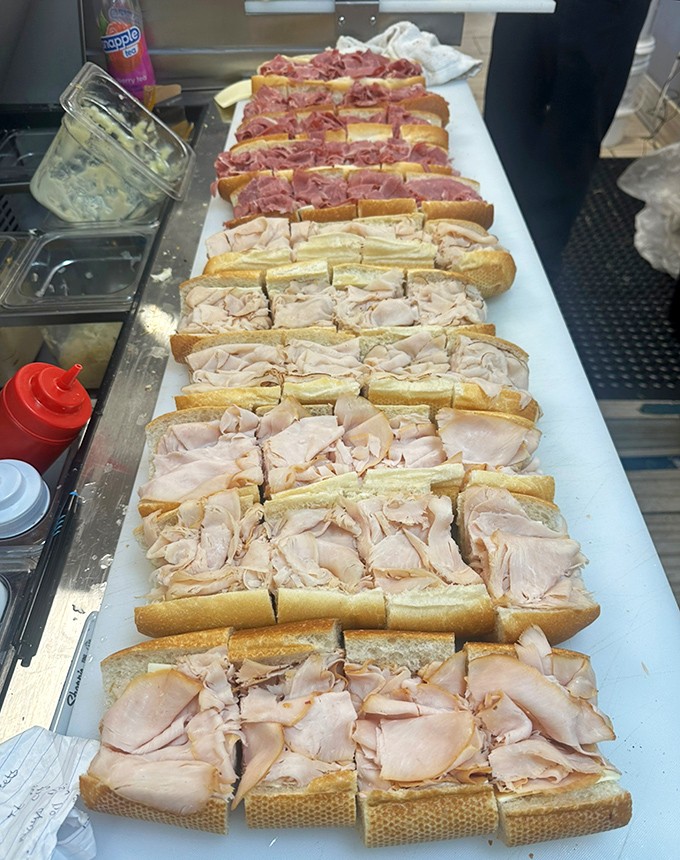 Assembly line of joy. These sandwiches-in-waiting showcase the care and abundance that goes into every Koch's creation.