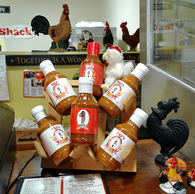 Their house-made sauces surrounded by chicken d&eacute;cor&mdash;a shrine to flavor that tells you these folks take their condiments as seriously as their poultry.