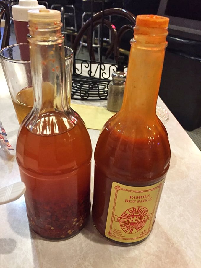 House-made hot sauces stand ready to add a kick to your seafood&mdash;liquid personality in bottles that have earned their place on every table.