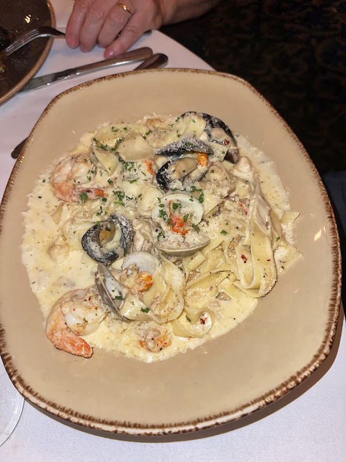 A seafood pasta so fresh you'll check for a tiny ocean under your table&mdash;clams, shrimp, and pasta dancing in perfect harmony.