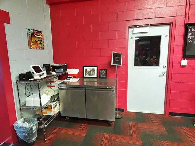Behind this counter, breakfast dreams become reality. The red walls aren't just decorative &ndash; they're warning signs that flavor explosions are imminent.