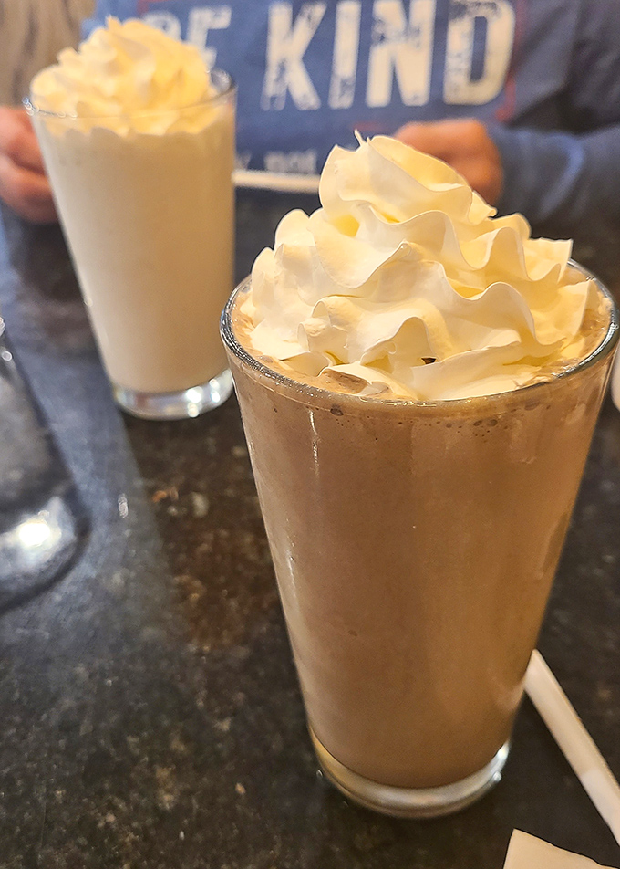 Milkshakes thick enough to require serious straw commitment. These frosty masterpieces make you wonder why we ever outgrew the dessert-before-dinner phase. 