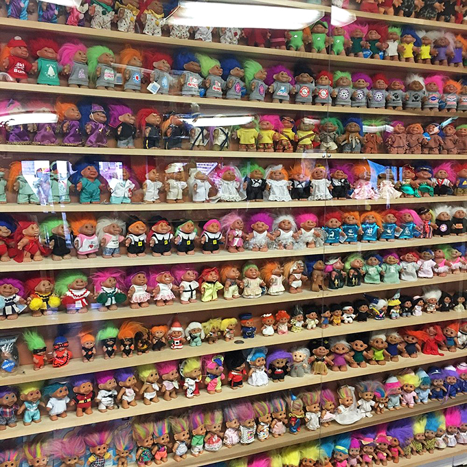 Floor-to-ceiling shelves transform childhood nostalgia into an organized museum of magnificent plastic proportions.