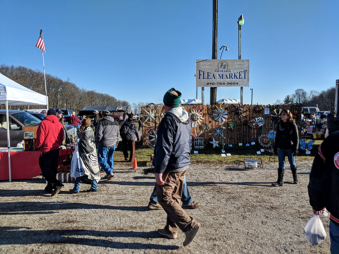 The entrance beckons with promises of discoveries beyond the gate, where early birds and serious collectors have already begun their quest.