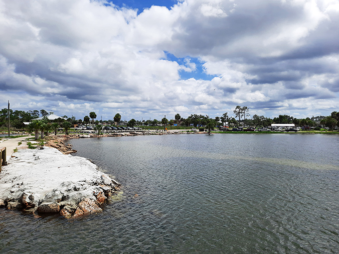 Explore the shoreline where gentle waters meet rocky outcroppings, creating natural fishing spots better than any man-made pier could design.