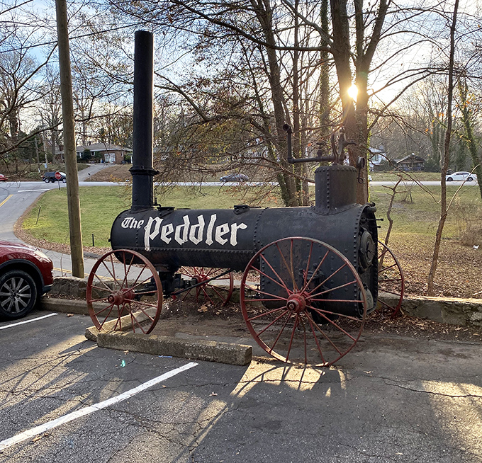 Not just a sign&mdash;a statement piece. This vintage steam engine announces The Peddler's presence with the same subtle charm as a foghorn.