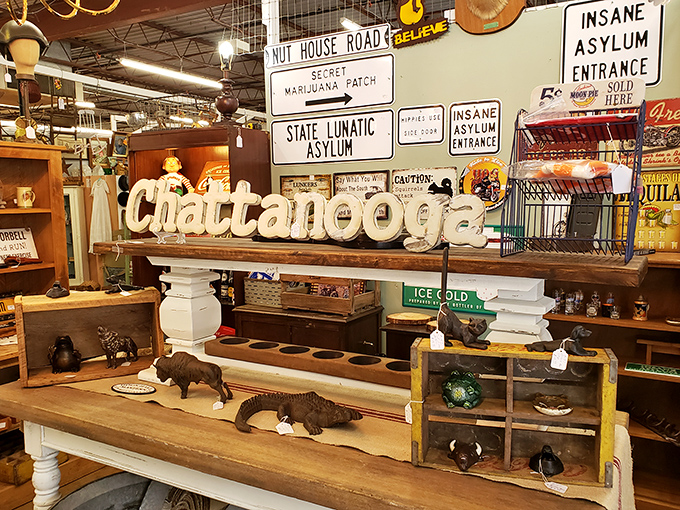 The "Chattanooga" sign and quirky asylum placards prove that yesterday's signage makes today's walls infinitely more interesting.