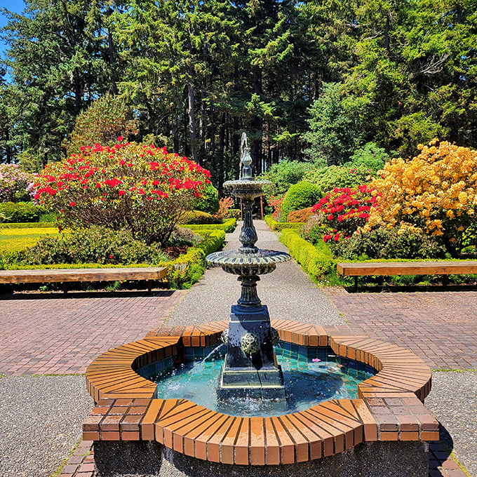 Water dances from this ornate fountain, the centerpiece of gardens that would make European royalty green with envy.