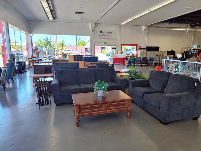 This navy sofa set has seen some Netflix marathons in its day, but it's ready for a second act in your living room drama.