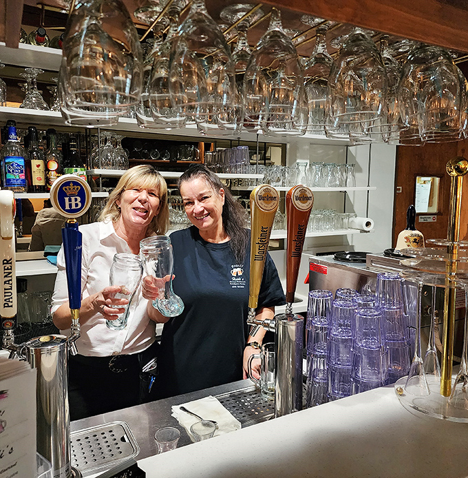 Behind every great German restaurant is a team that knows their schnitzel. The bar area showcases an impressive array of glassware ready for Bavarian brews.