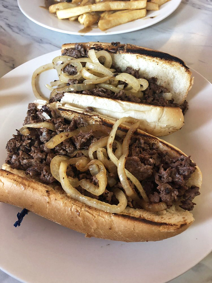 The steak sandwich that launched a thousand lunch breaks&mdash;thinly sliced beef and caramelized onions on a roll that refuses to surrender.