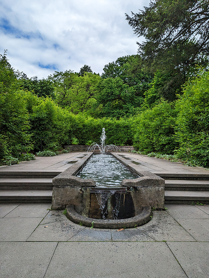 Water features that would make Neptune jealous. This linear fountain creates perfect symmetry in a garden that refuses to be ordinary.