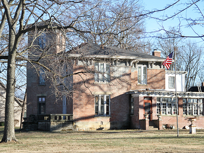 The Hitchens House stands as a beautiful brick sentinel, its wraparound porch practically begging for rocking chairs and glasses of lemonade.