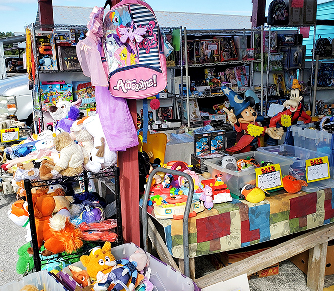 Disney characters mingle with teddy bears in this nostalgic toy booth. That Mickey figurine probably saw the opening day of EPCOT.