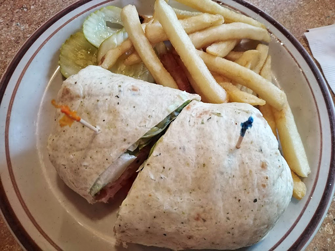 A wrap so perfectly executed it makes you question why you ever eat unwrapped food. Simple ingredients transformed into a portable masterpiece of flavor.