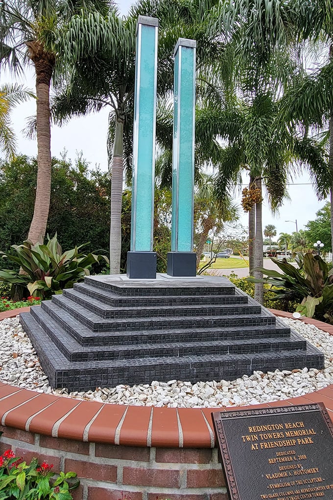 A poignant reminder amid paradise. The Twin Towers Memorial at Friendship Park offers a moment of reflection with its elegant aqua columns.