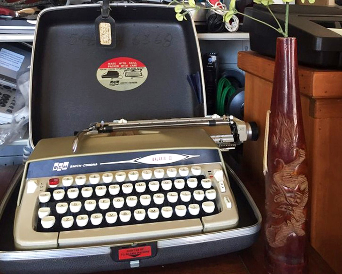 The writer's dream: a perfectly preserved Smith-Corona typewriter that once clacked out someone's unfinished novel, now awaiting your story.