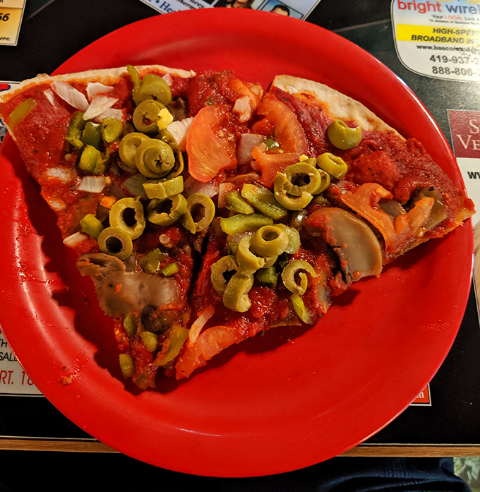 A vegetarian's dream that proves meatless doesn't mean joyless – those green olives are practically winking at you.