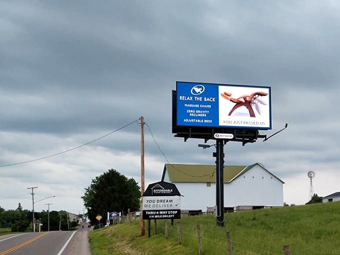 No filter needed when Mother Nature does the decorating. The billboard for modern comforts stands in amusing contrast to the simpler life surrounding it.