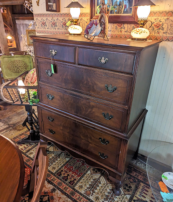 This isn't just a dresser; it's a masterpiece of woodworking with drawers deep enough to hide all your modern-day secrets.