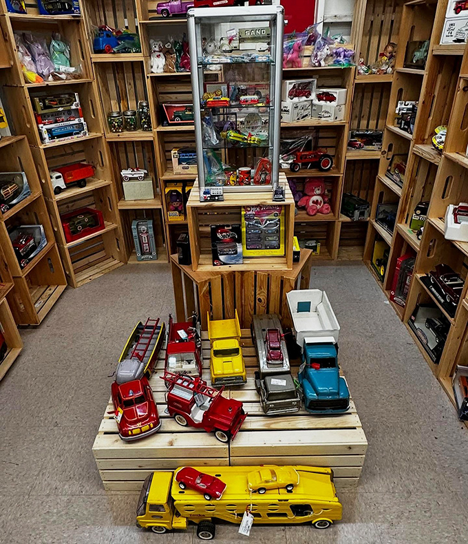 A wonderland of miniature vehicles where grown men suddenly remember the exact sound effects they made while playing with identical toys decades ago.