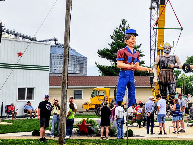 Crowds gather to witness a giant installation. These massive figures require serious equipment to stand tall&mdash;and provide the perfect backdrop for America's most unique vacation photos.